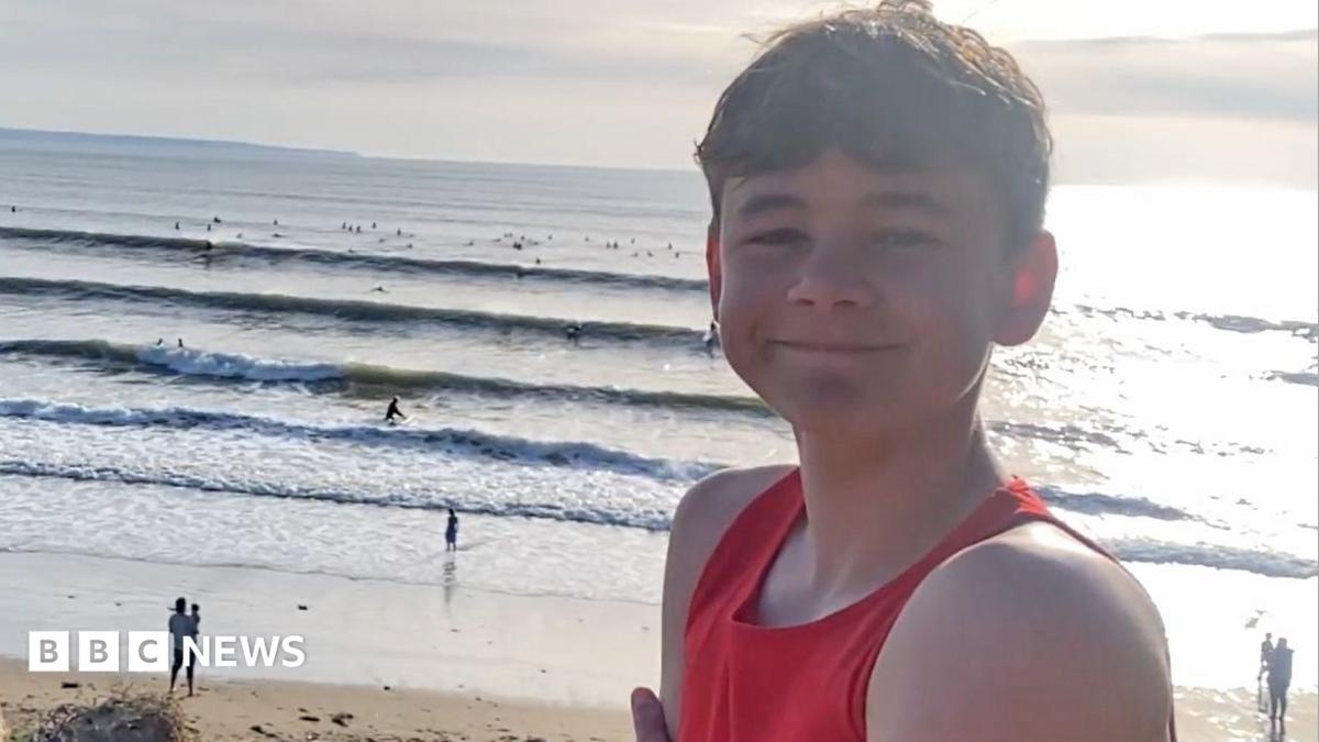 Boy saves man's life in 'textbook' Saunton Sands surf rescue - BBC News