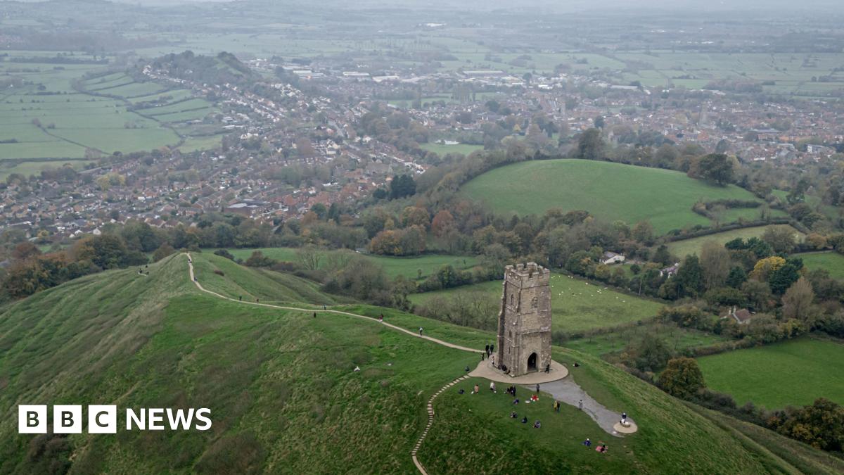 Glastonbury Tor : Homes within view of landmark 'a travesty' - BBC News