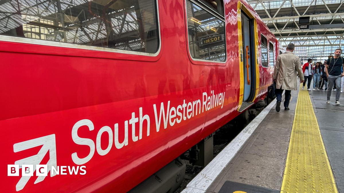 Incident on rail line between Wimbledon and Woking hits services - BBC News