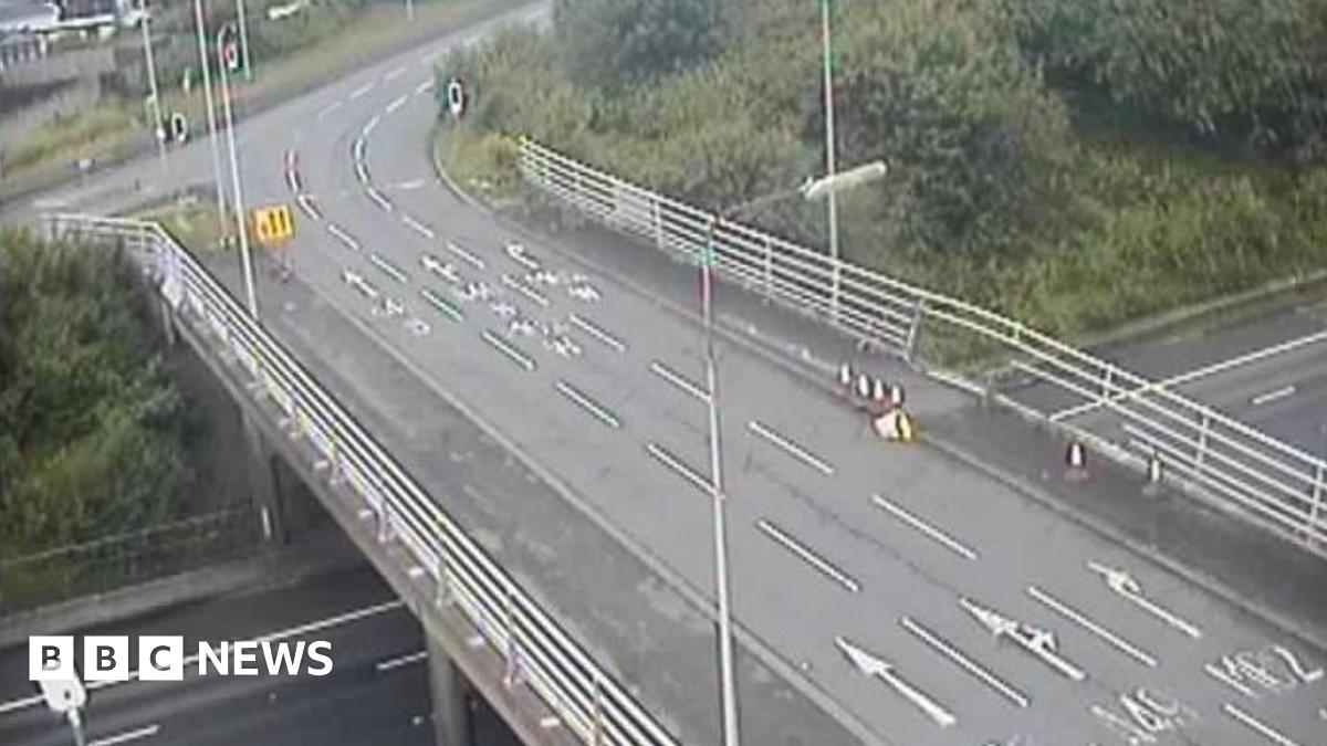 Emergency repairs on M62 after lorry crash causes fuel leak - BBC News