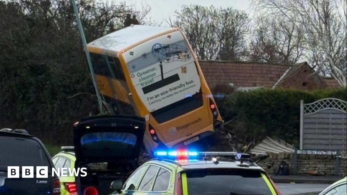 Cheltenham road closed after double-decker A46 bus crash - BBC News