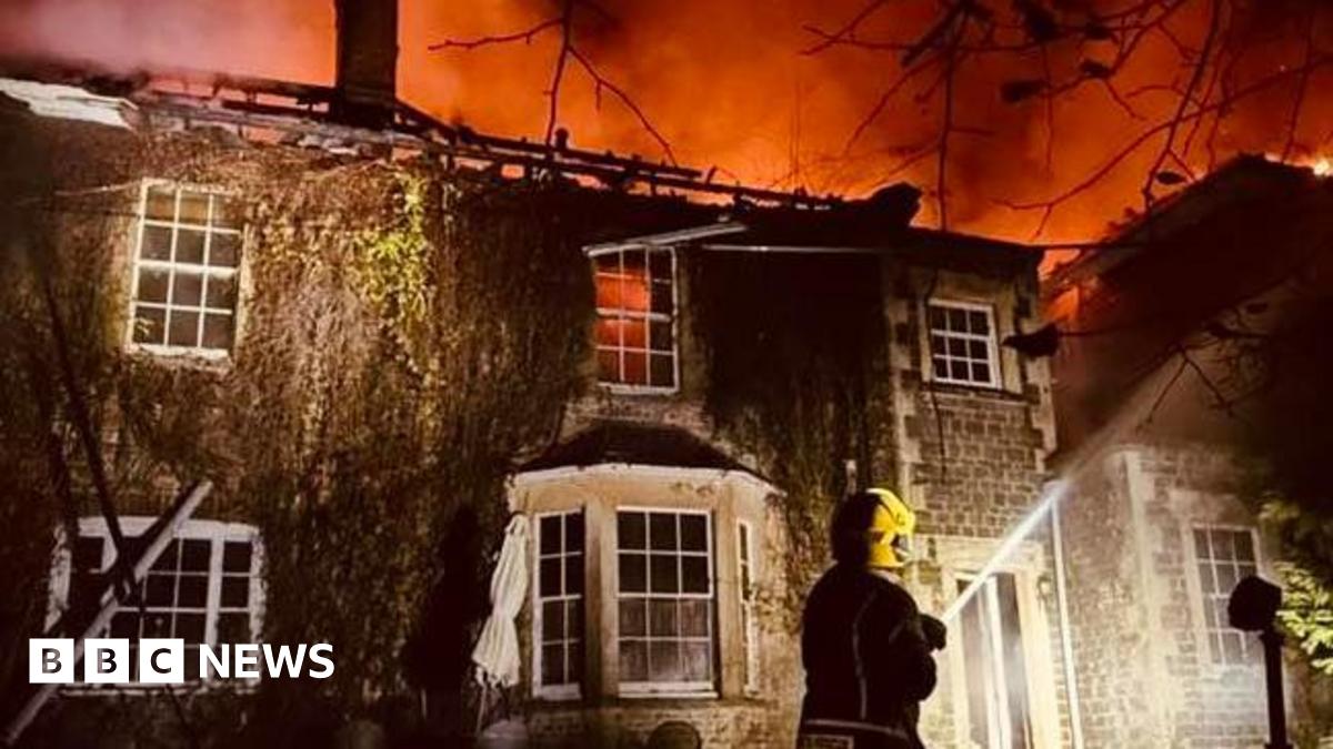 Large house fire near Warminster leads to arson arrest - BBC News