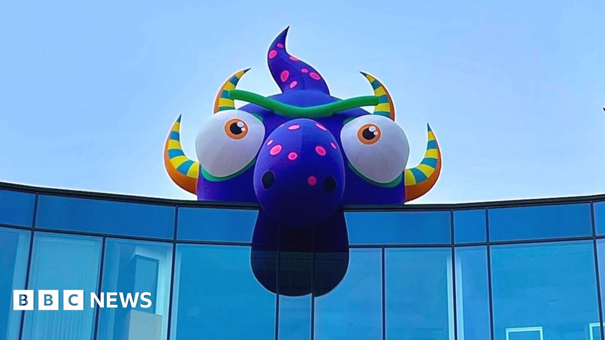 Monsters climb buildings in Leicester city centre - BBC News
