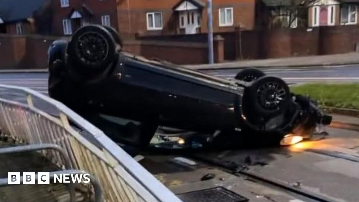 Sheffield trams suspended after car crashes and overturns on tracks ...