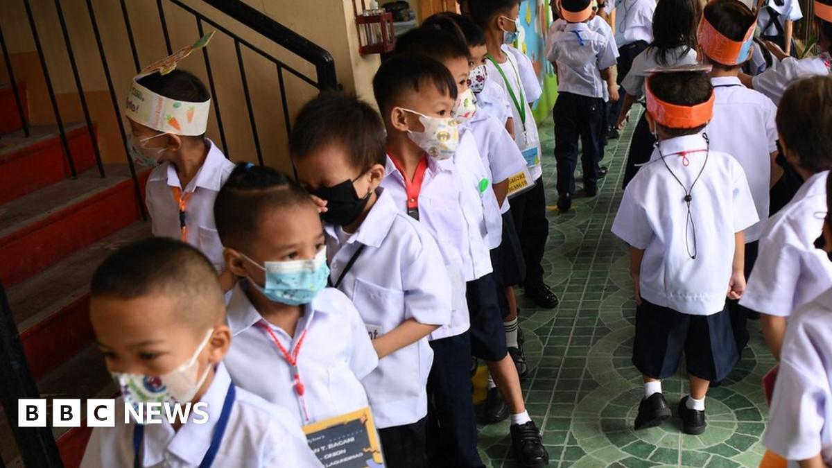 Philippine students return to school for first time since Covid - BBC News
