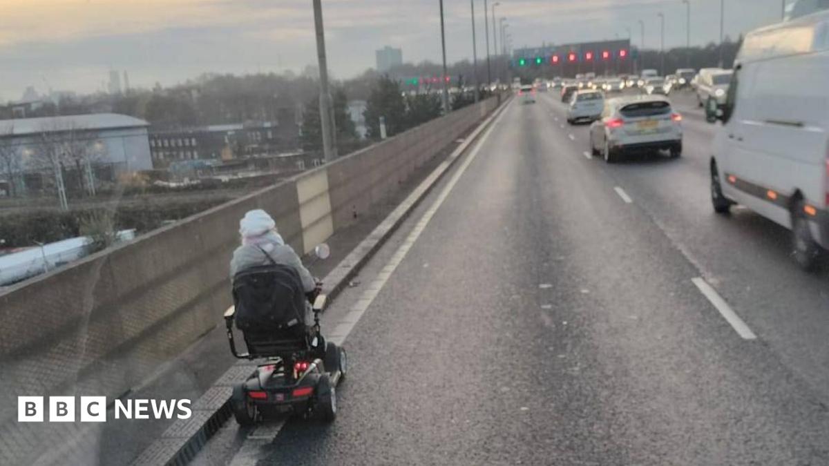 Driver shields woman in mobility scooter on Birmingham's A38M - BBC News