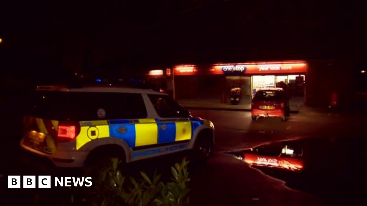 Armed robber makes off with cash from Bordon store - BBC News