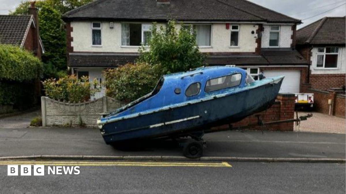 Marooned boat on final voyage to council crusher - BBC News