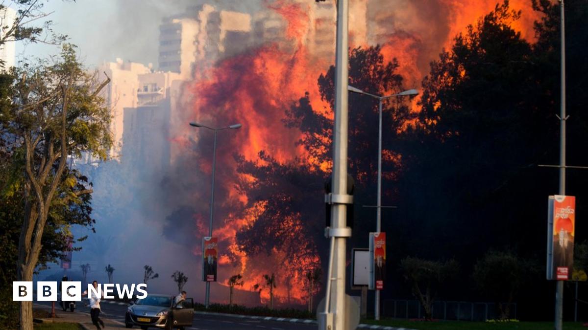 Israel fires: Tens of thousands flee as fires hit Haifa - BBC News