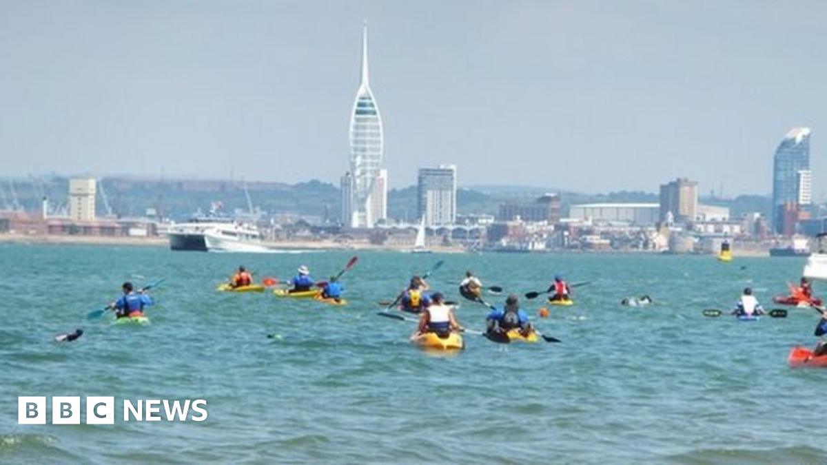 Solent swim for motor neurone charity - BBC News