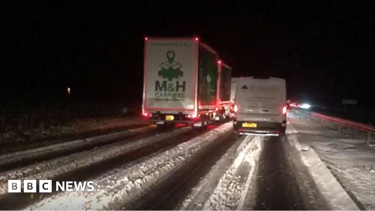 Bus and lorry crash in wintry conditions on A90 - BBC News