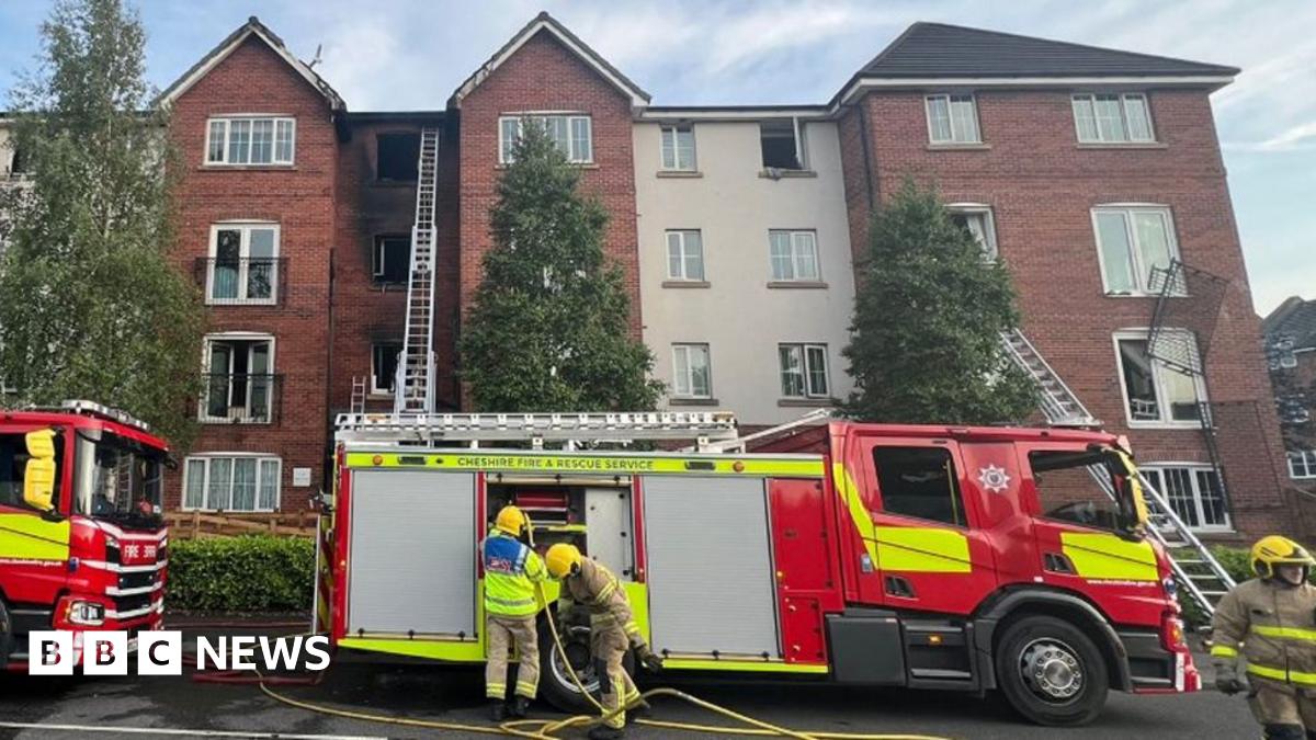 Boy, 10, arrested over fire at block of flats - BBC News