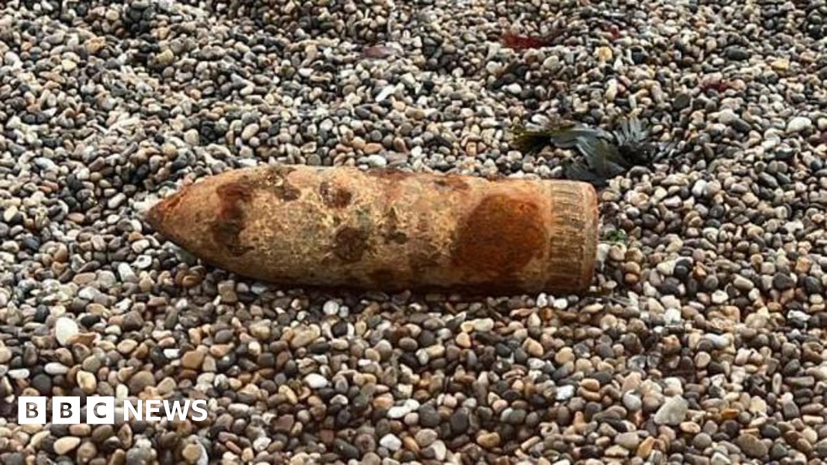 Suspected bomb on Beer beach washed out by tide - BBC News