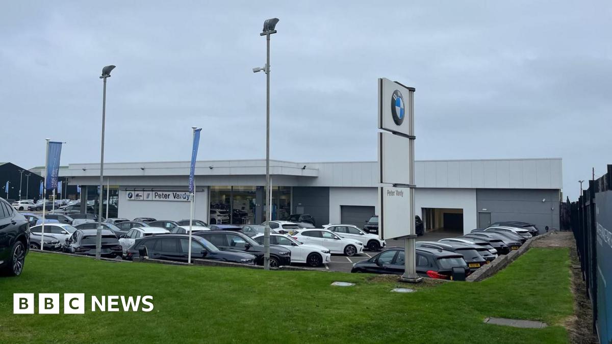 Man arrested over alleged rape at Edinburgh car showroom - BBC News