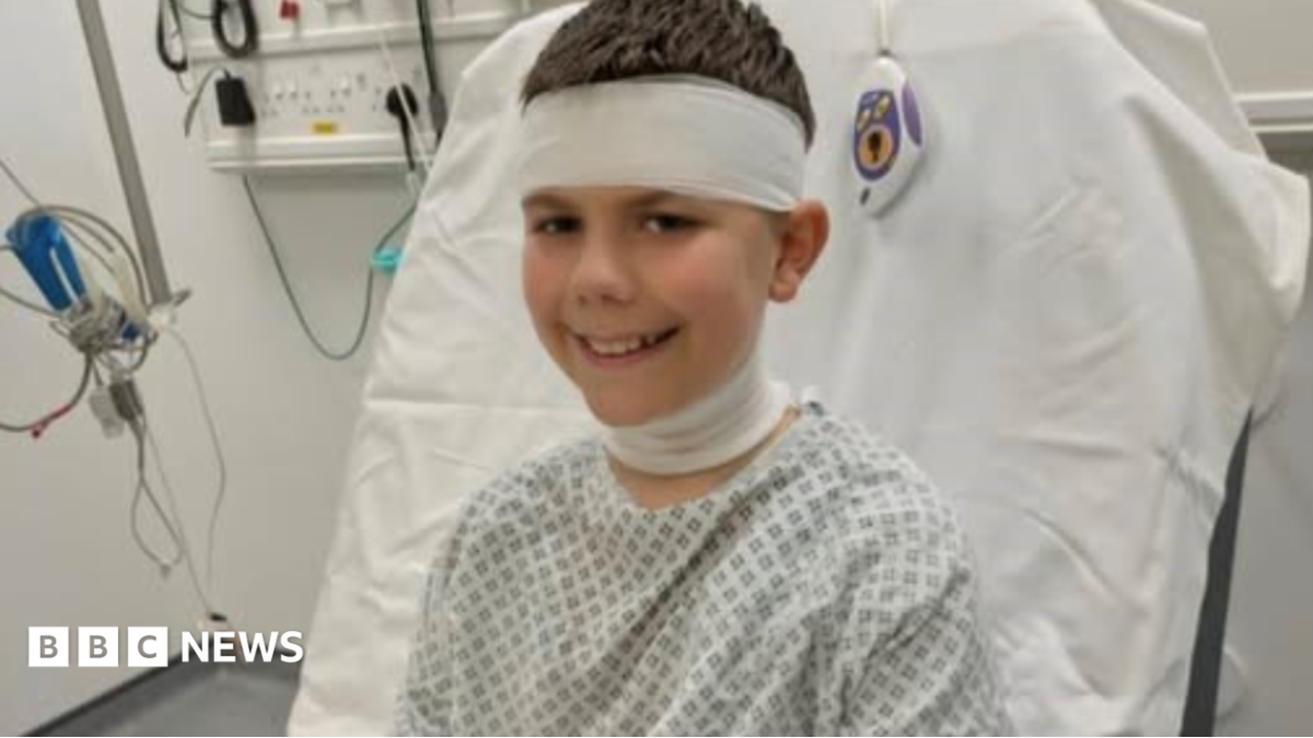 Boy burned saving sister from firework at Pontypool display - BBC News