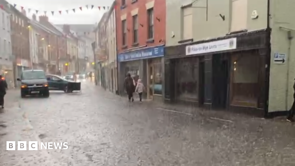 Heavy rain brings flash flooding and warning of disruption - BBC News