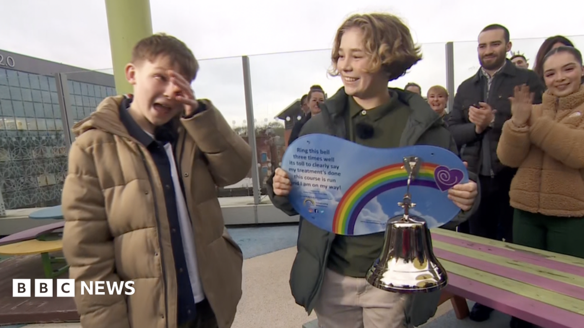 Burnley teen's joy as he rings bell at end of cancer treatment - BBC News