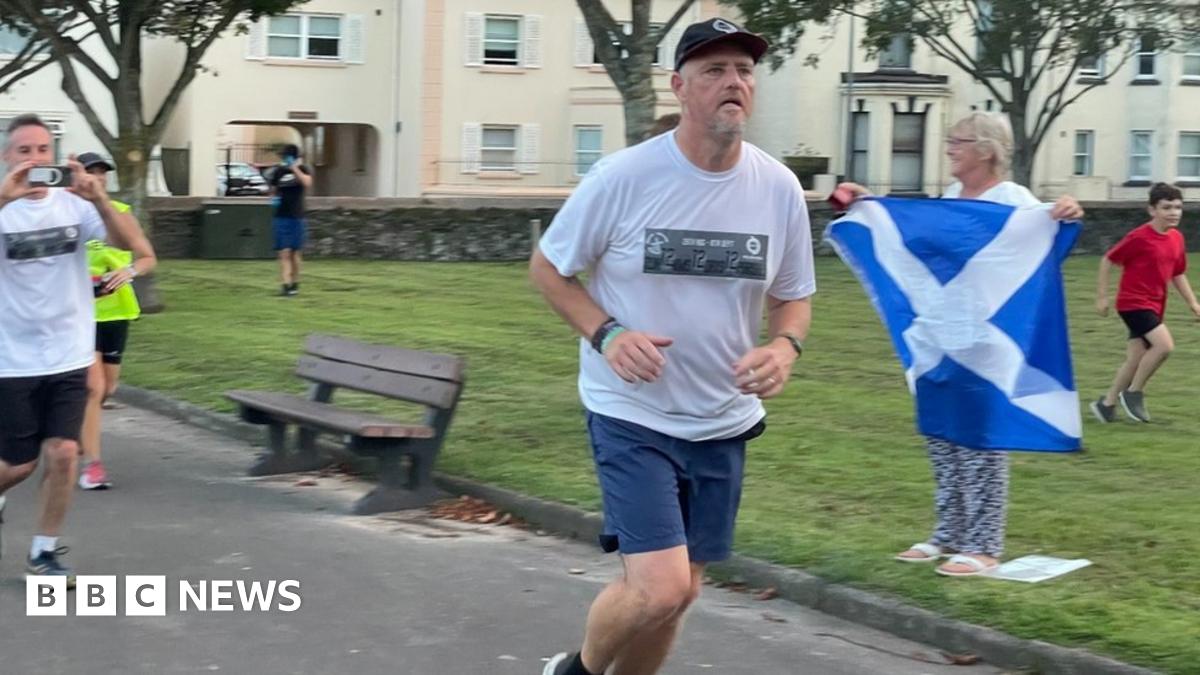 Jersey's running reverend completes 12-day challenge - BBC News