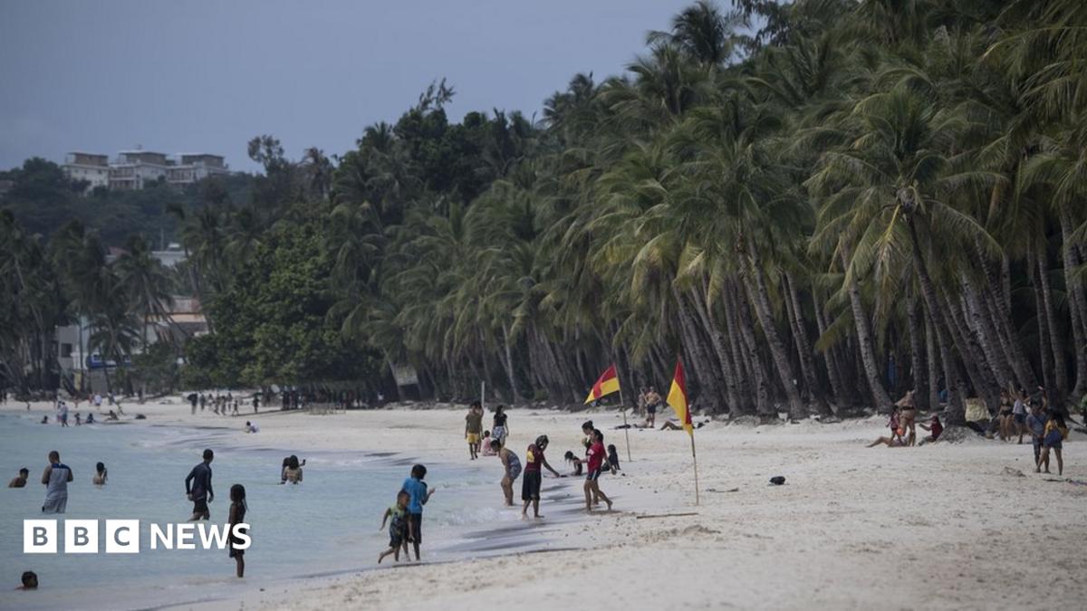 Boracay Beach: Section closed after tourist filmed burying nappy - BBC News