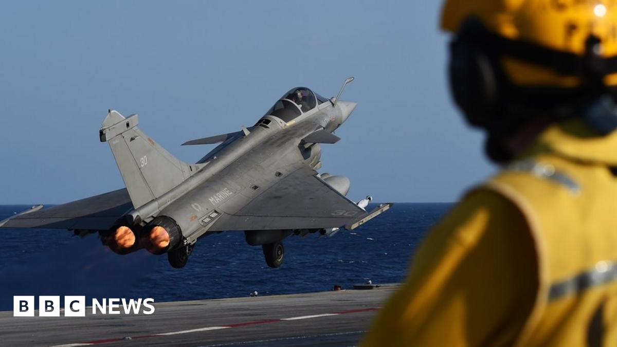 Paris attacks: France launches anti-IS strikes from carrier - BBC News