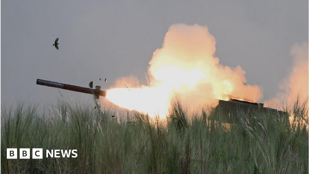 Australian defence review plots pivot from armour to missiles - BBC News