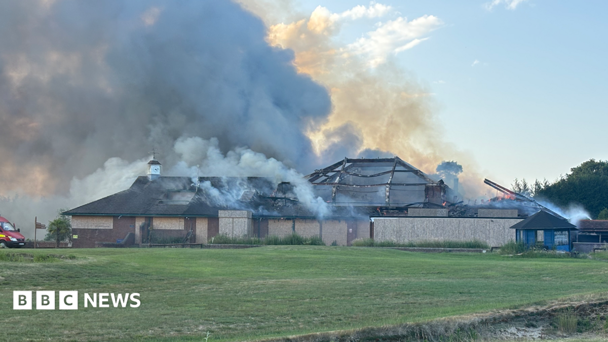 Firefighters on scene of 'destroyed' former golf club building - BBC News