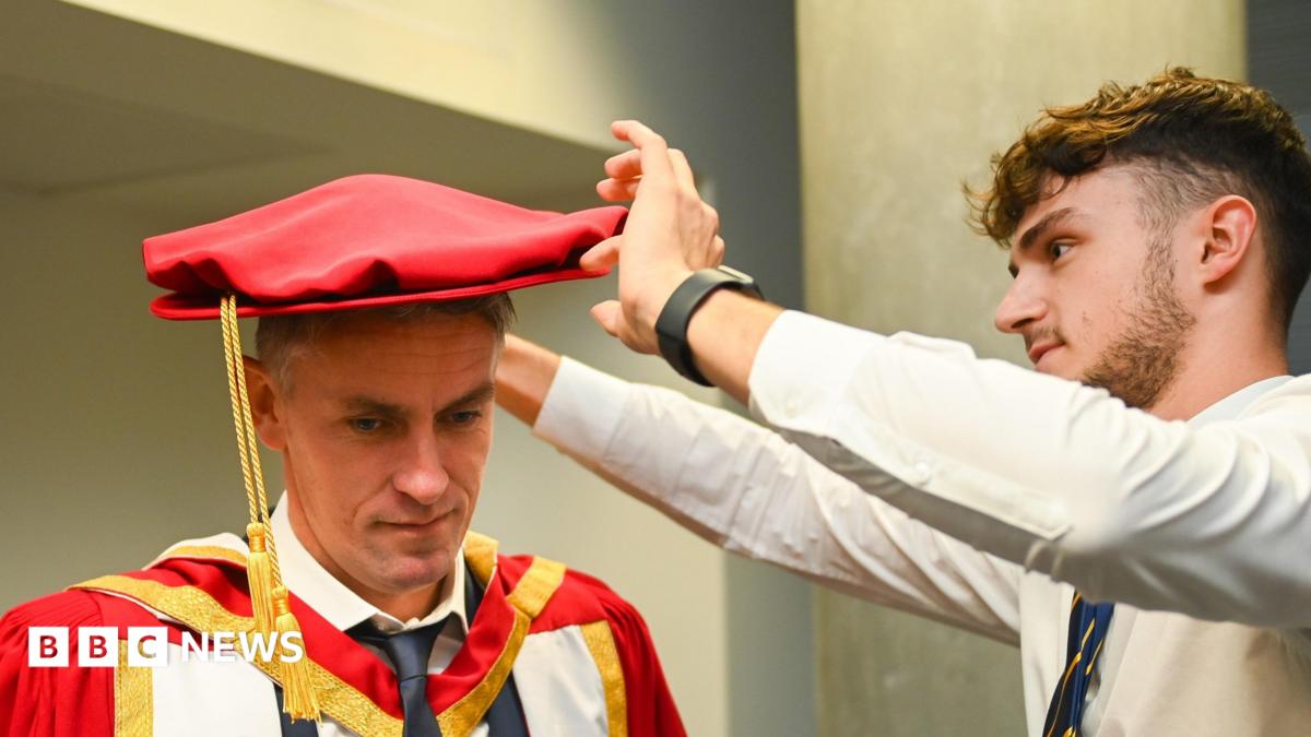 Ipswich Town boss McKenna gets University of Suffolk doctorate - BBC News