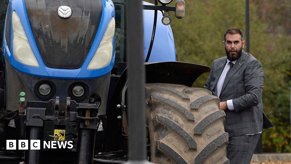 Luke Poots fined for using phone while driving tractor - BBC News
