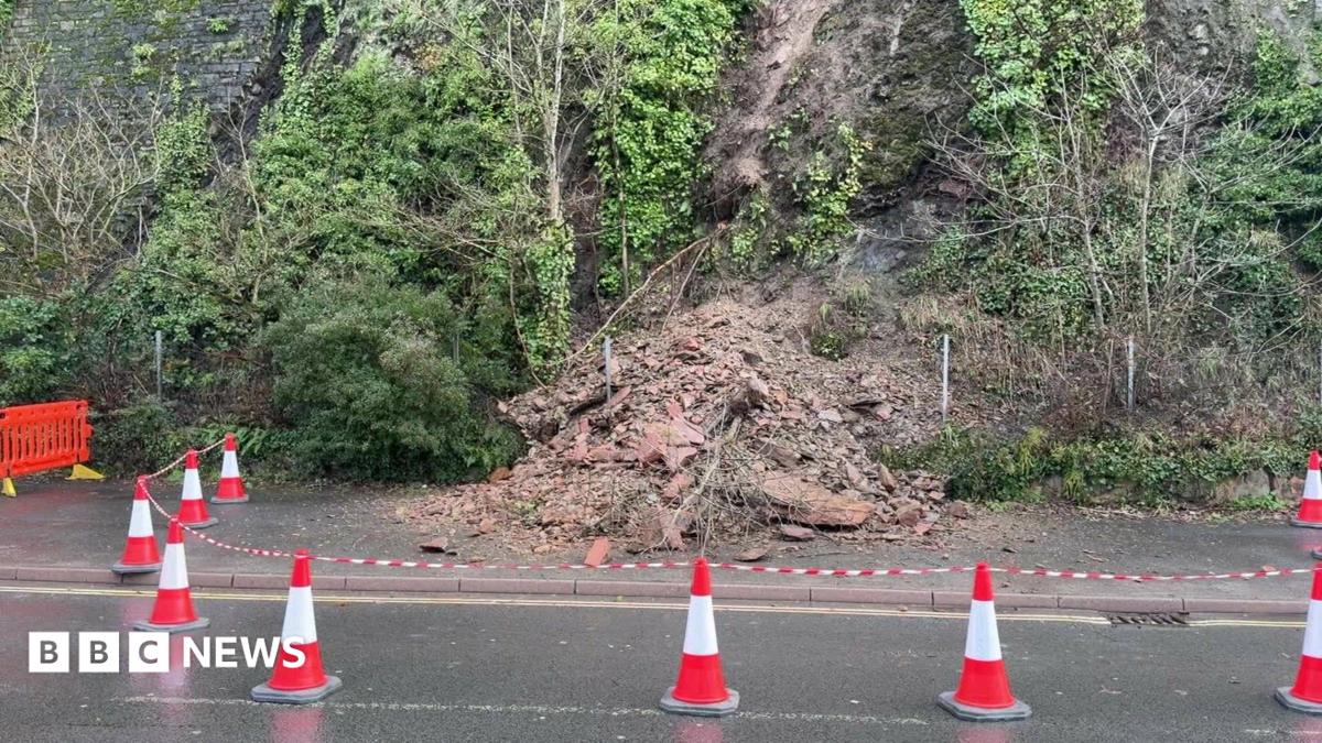 Major road closed after landslip in Exeter - BBC News