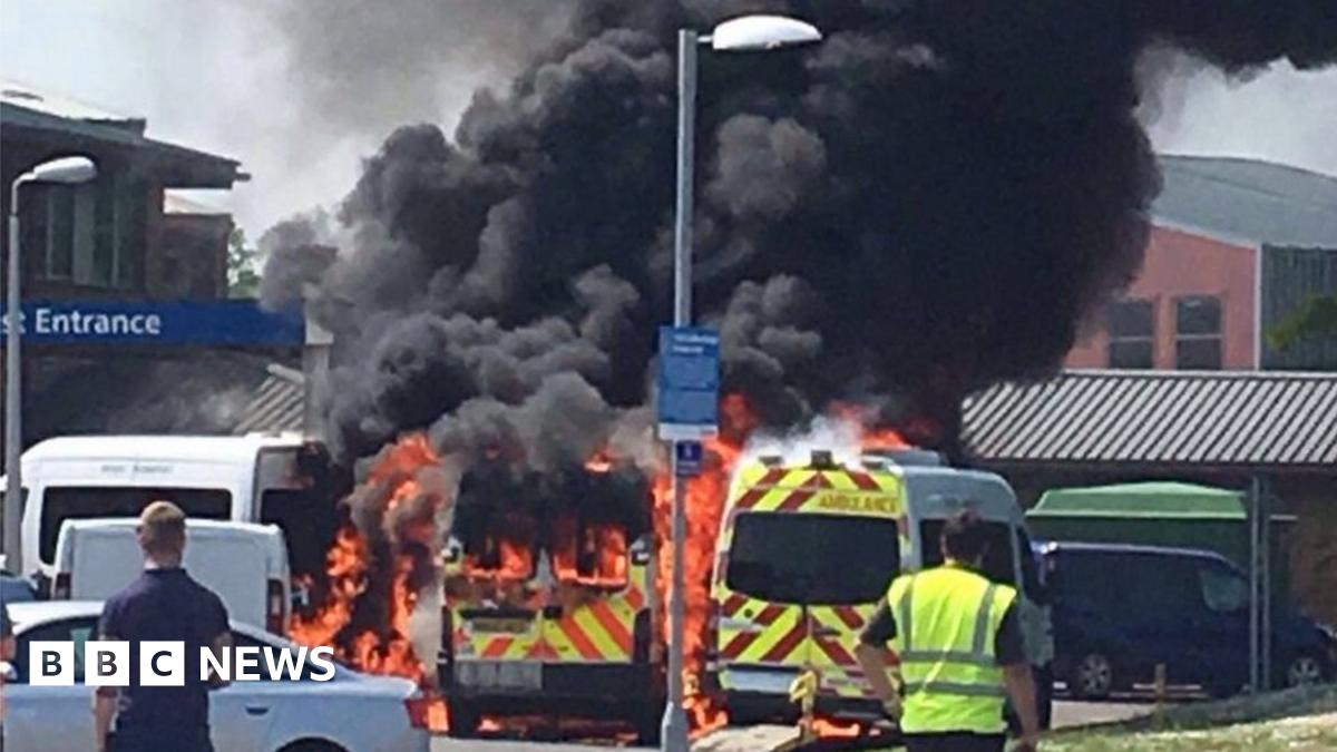 Fire destroys ambulances outside East Surrey Hospital - BBC News