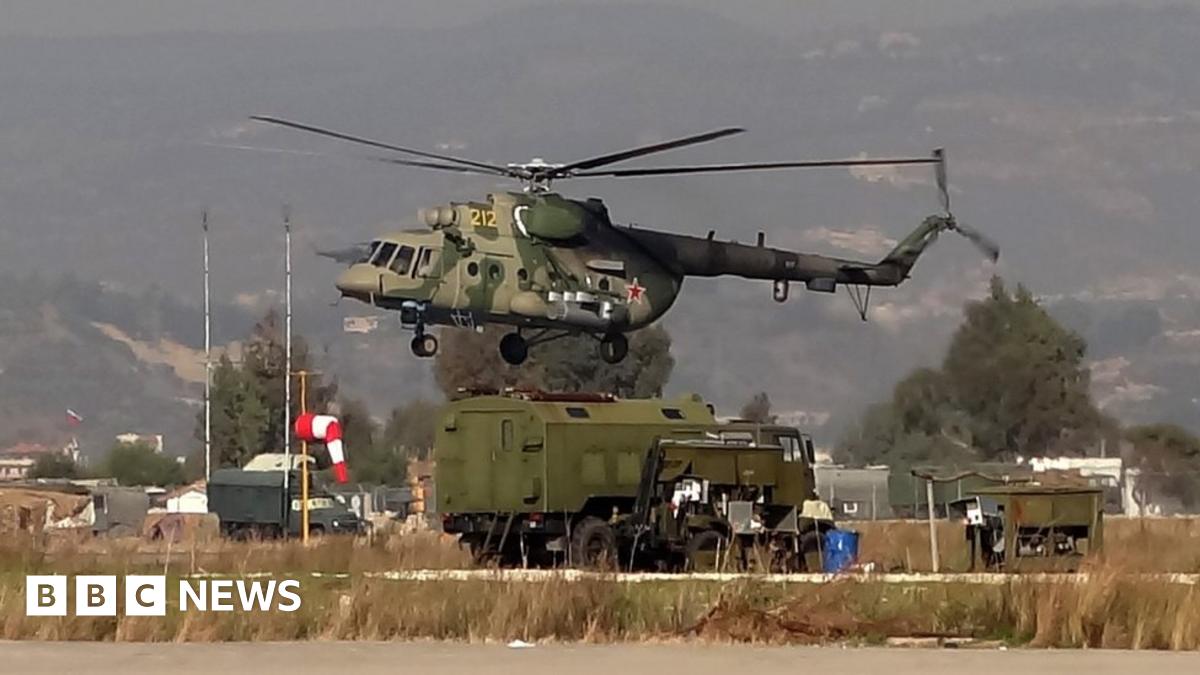 Syria conflict: Russian helicopter crashes, killing two crew - BBC News