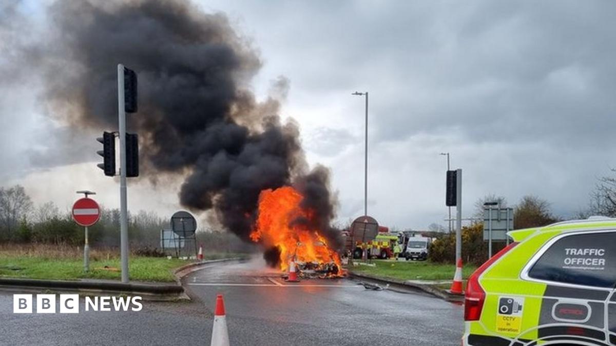Wiltshire M4 slip road closed as car catches fire - BBC News