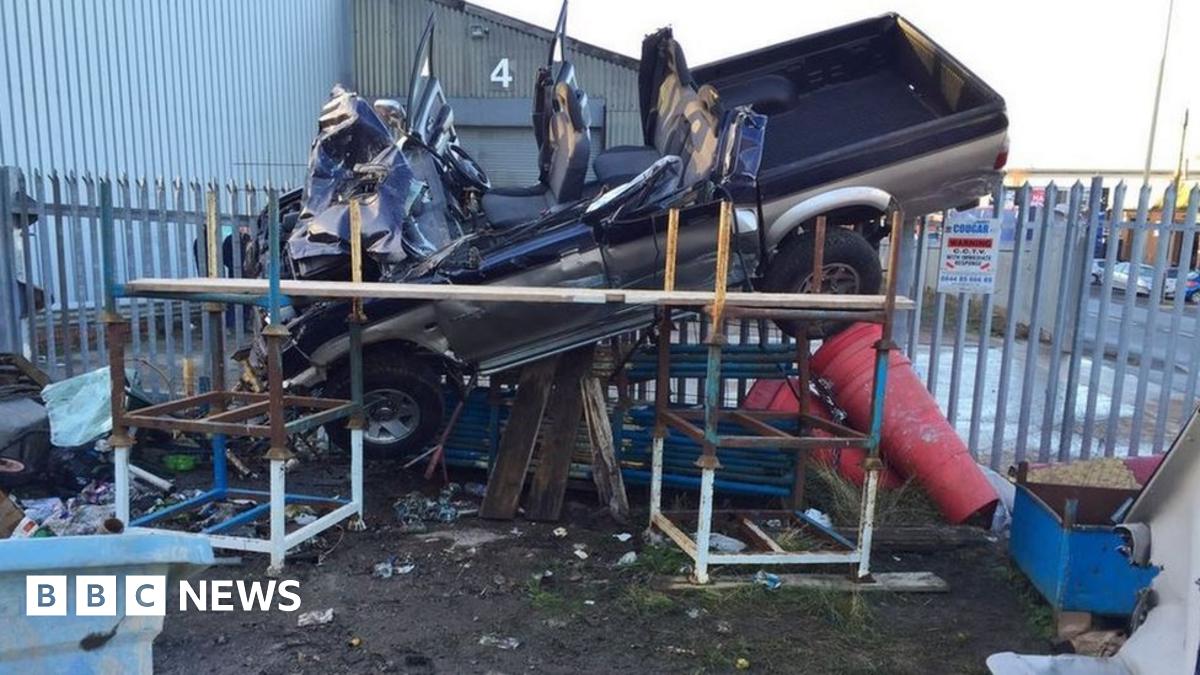 Man rescued as pick-up truck impaled on fence in Dudley - BBC News