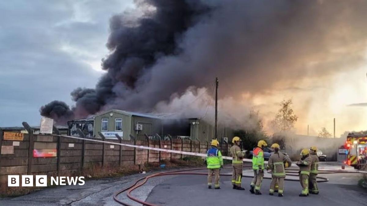 Building and lorries damaged in Adlington industrial estate fire - BBC News
