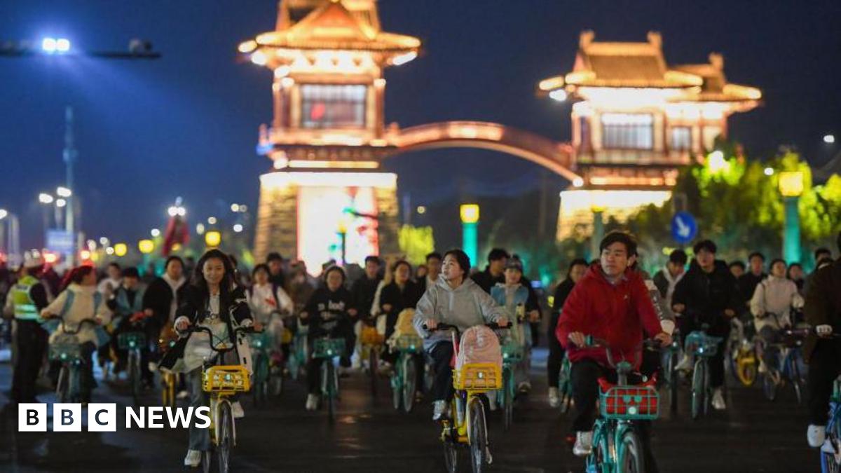 China roads blocked by thousands of cyclists in night quest for ...