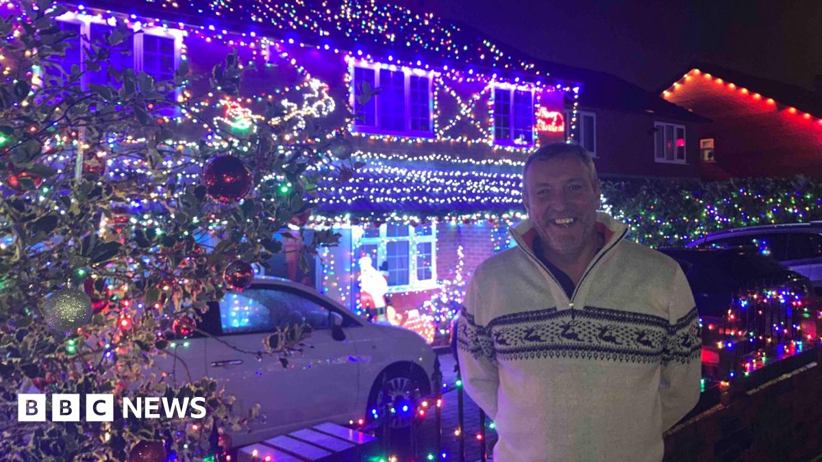 Neighbours raise £20k for Dougie Mac hospice with lights display - BBC News