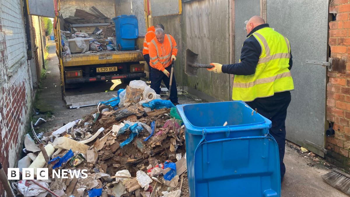 Large pile of builders' waste dumped outside Hull shop - BBC News
