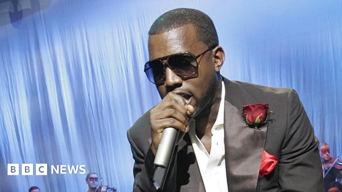Kanye posts photos of his record deal amid dispute - BBC News