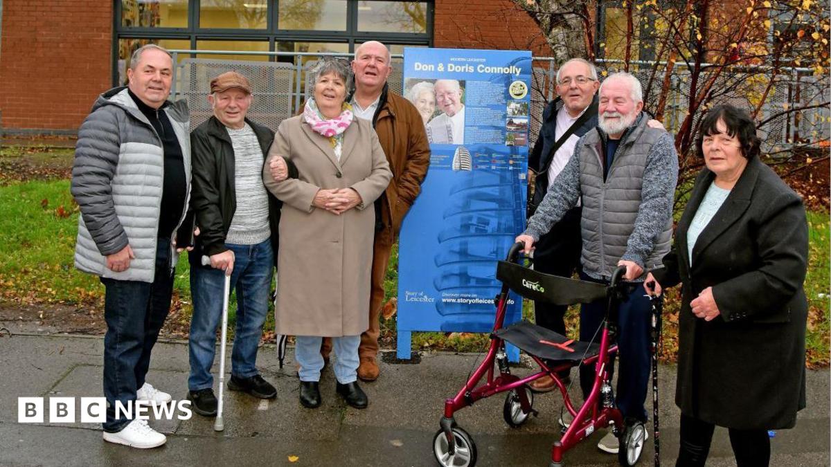 Plaque honours 'remarkable' couple's work in Leicester estate - BBC News