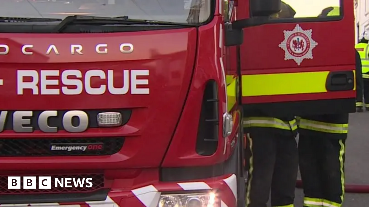 Firefighters tackle caravan blaze in Sidmouth - BBC News