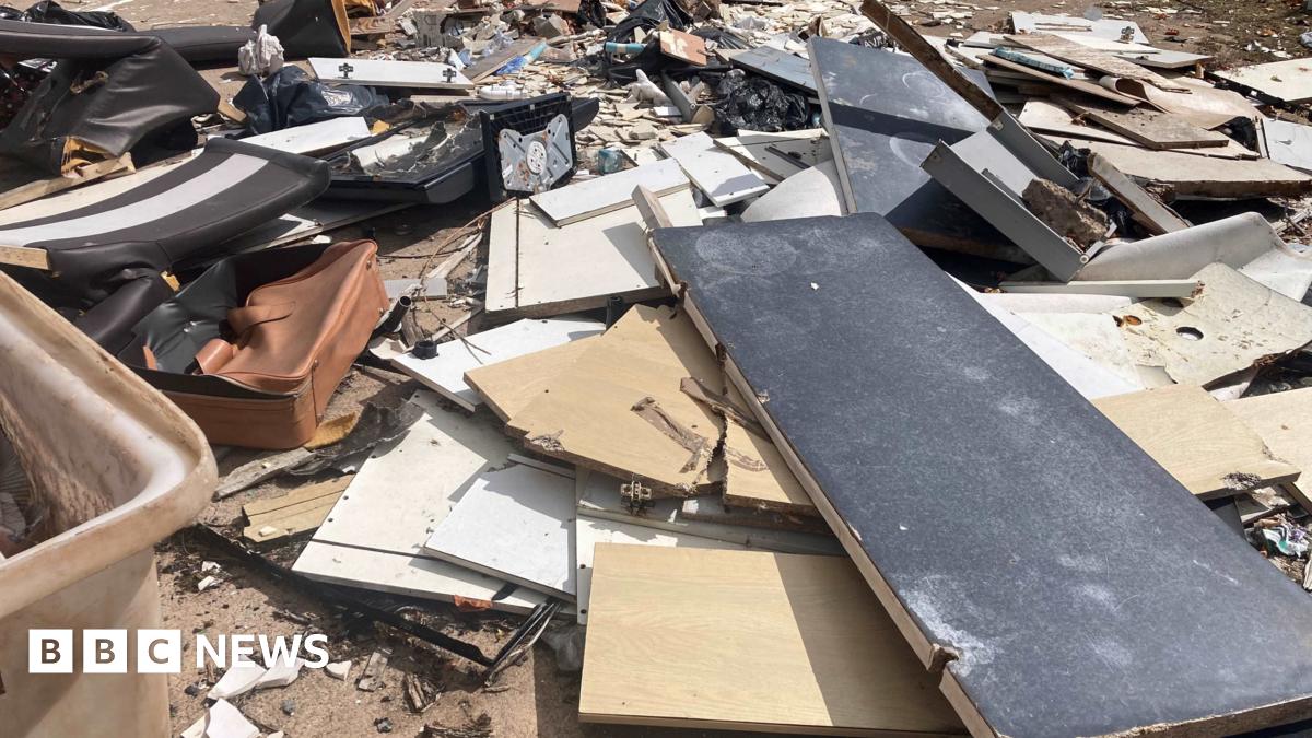 Council investigates large fly-tip dumped in lane in Kempsey - BBC News
