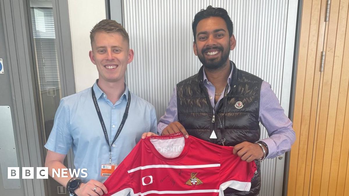 Doncaster Rovers fan wins £9,000 after placing £20 bet - BBC News