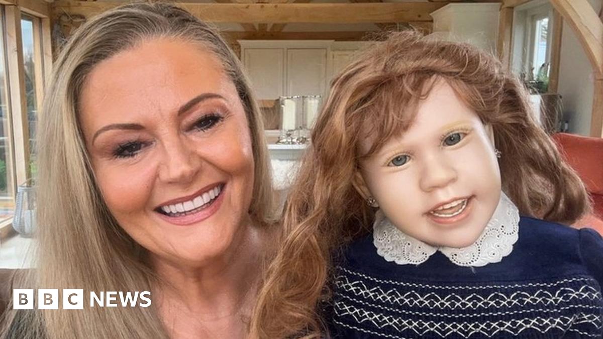 Celebrity psychic buys 'creepy' doll from Edinburgh charity shop - BBC News