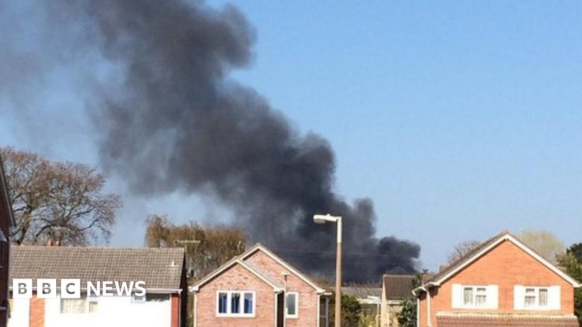 Fire crews tackle Poole industrial estate fire - BBC News