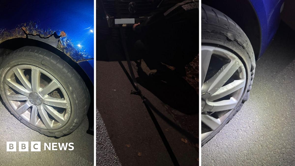 Driver seen towing car on motorway near Stafford using seatbelts - BBC News