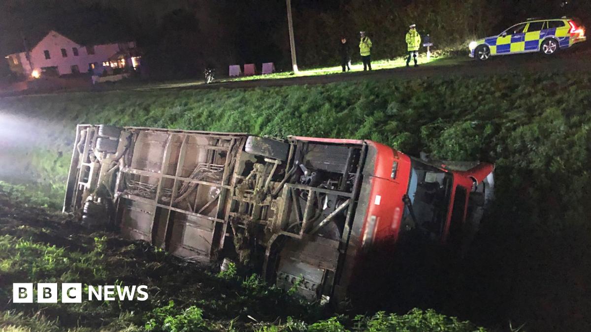 Six children rescued after bus crashes into ditch in Wisbech - BBC News