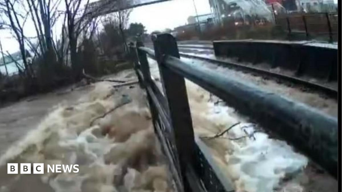 Railways 'unsafe' and hundreds hit by power cuts amid downpours - BBC News