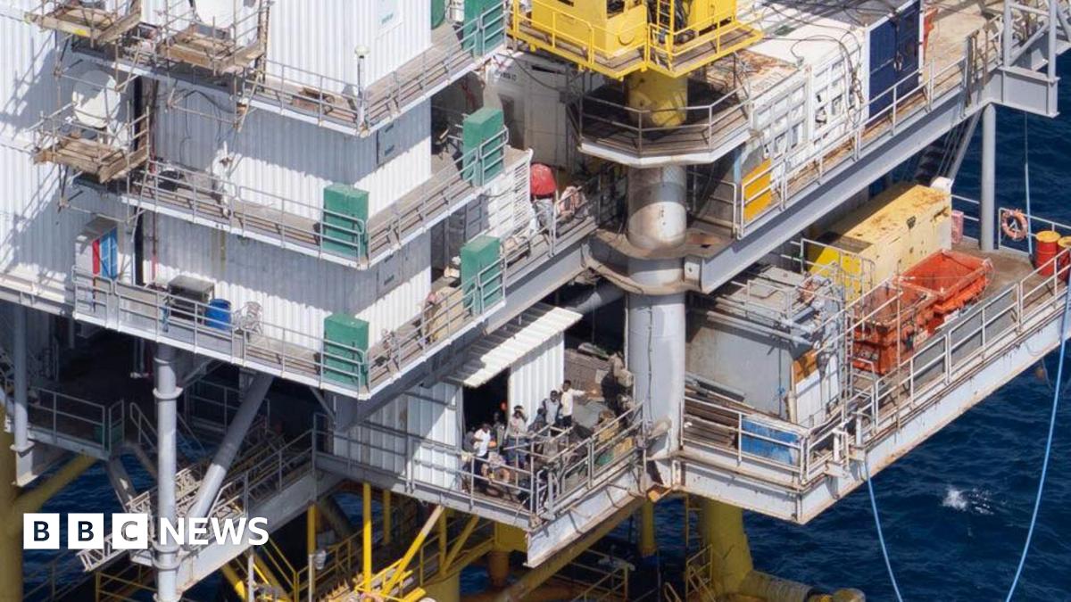Migrants rescued after several days stranded on oil platform - BBC News