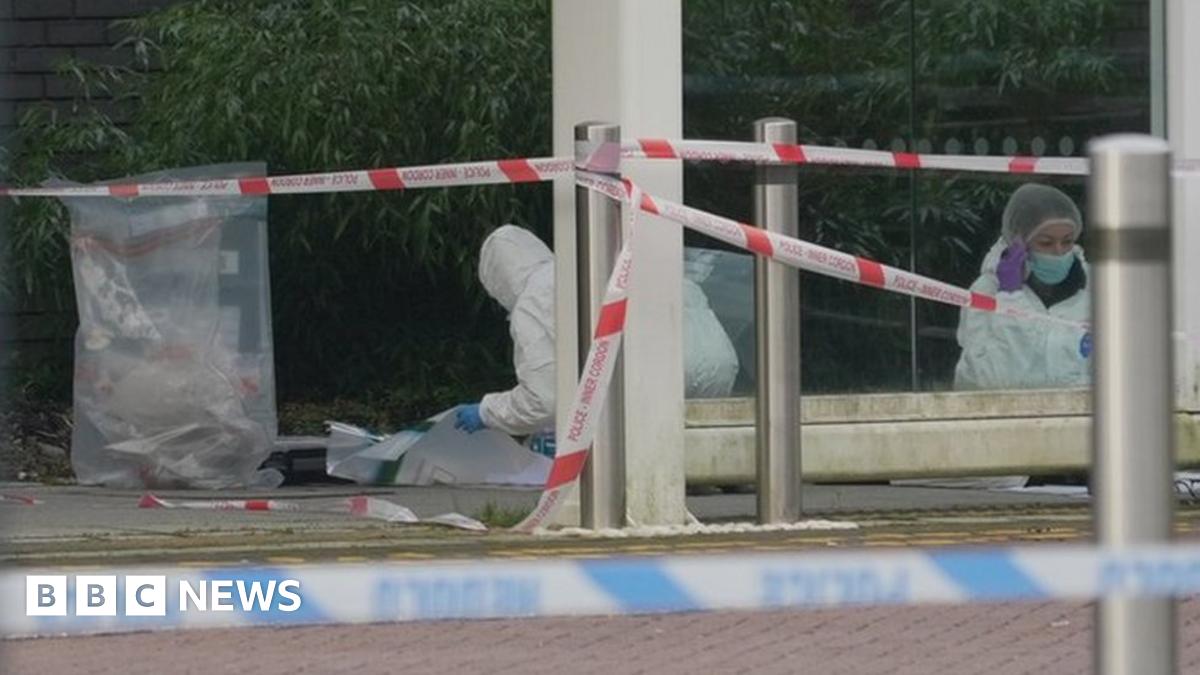 Tonypandy: Police probe death of man found outside hospital - BBC News