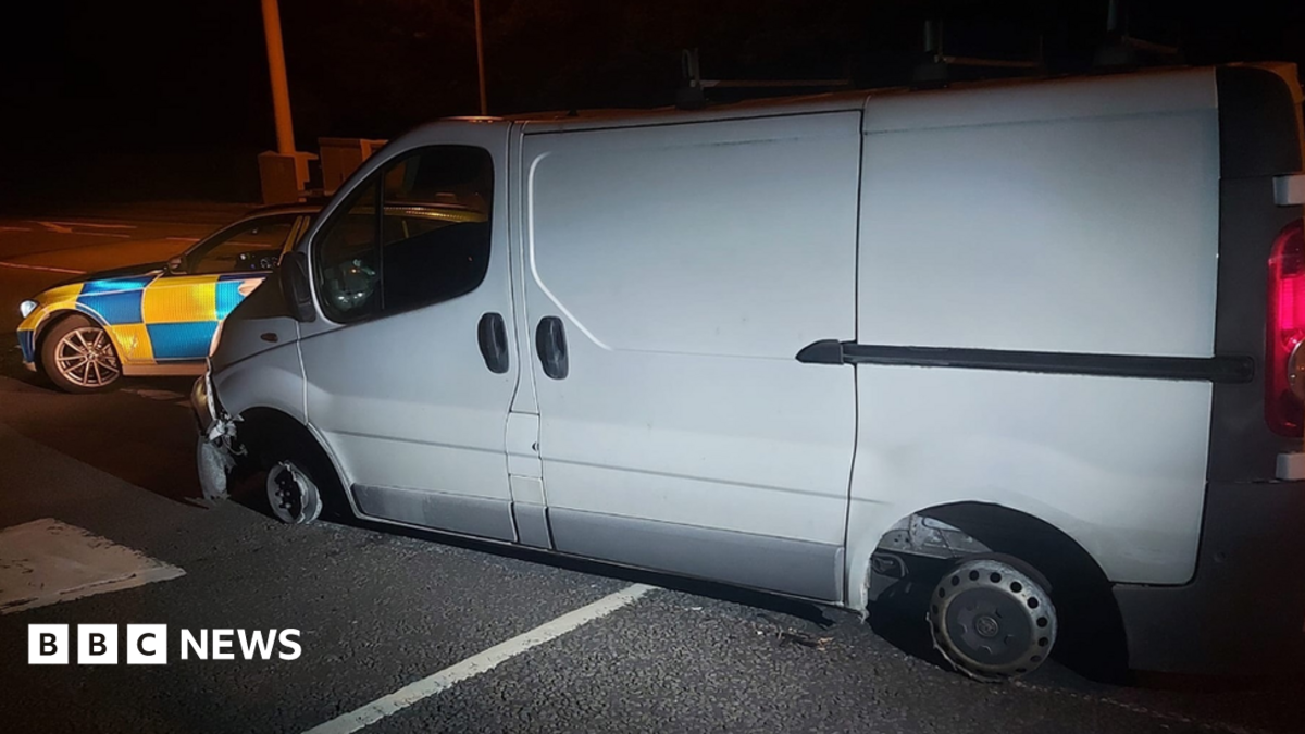 Man arrested after driving van with two tyres missing - BBC News